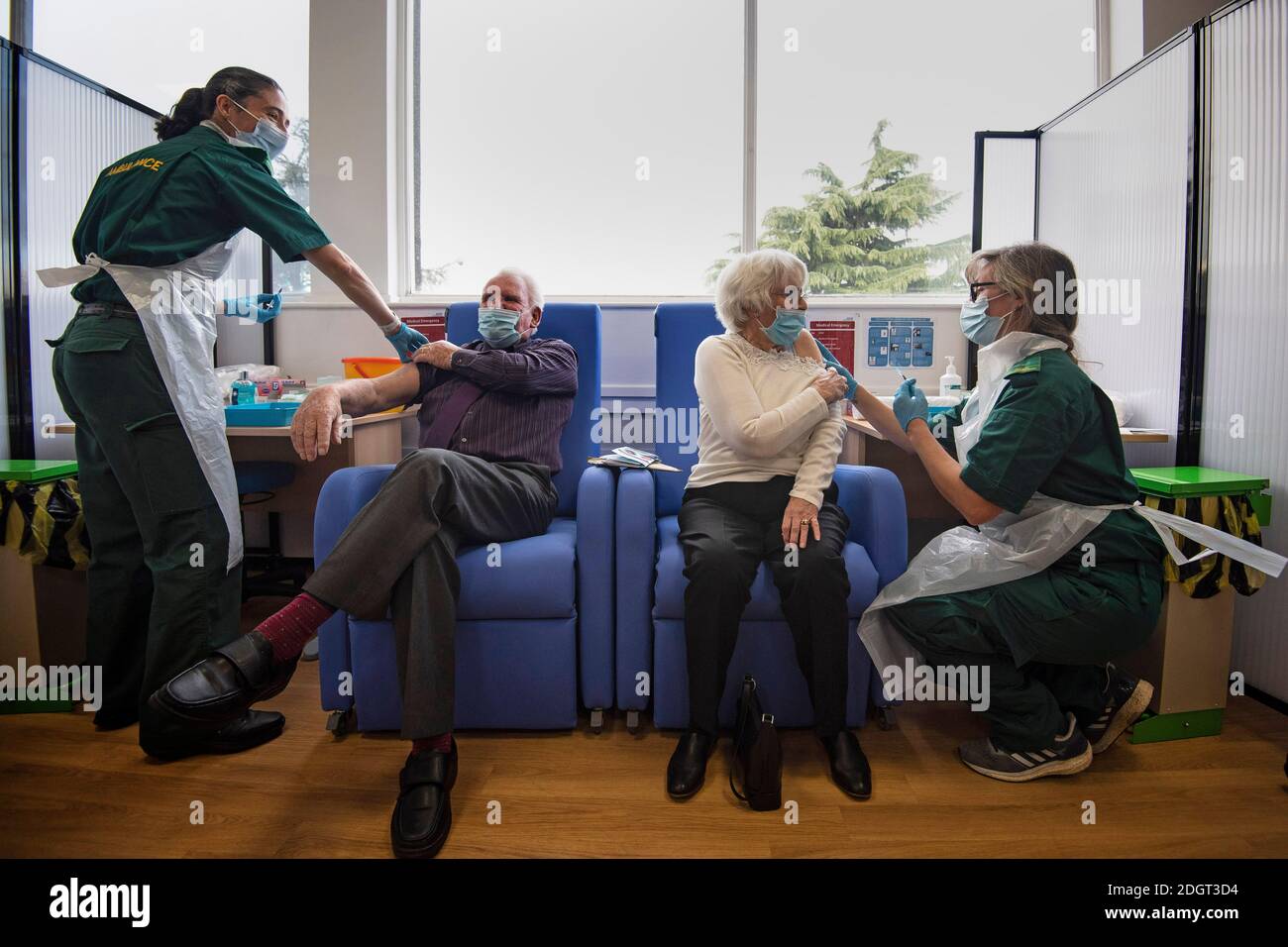 Husband and wife Vic and Penny Griffiths receive the Pfizer/BioNTech ...