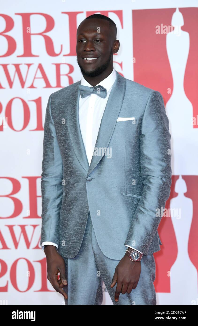 Stormzy attending the Brit Awards at the O2 Arena, London. Photo credit ...