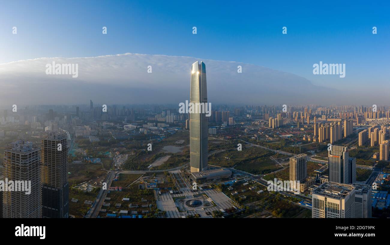 An aerial view of Wuhan Center, a local super tall skyscraper, erecting ...