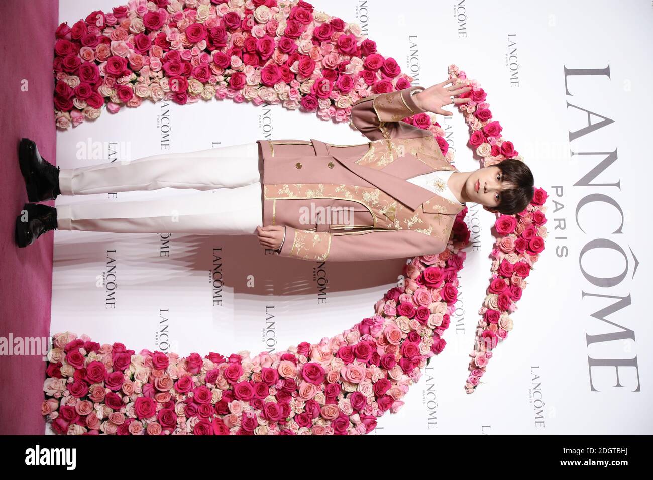 Chinese singer He Changxi attends a Lancome red carpet event in Beijing ...