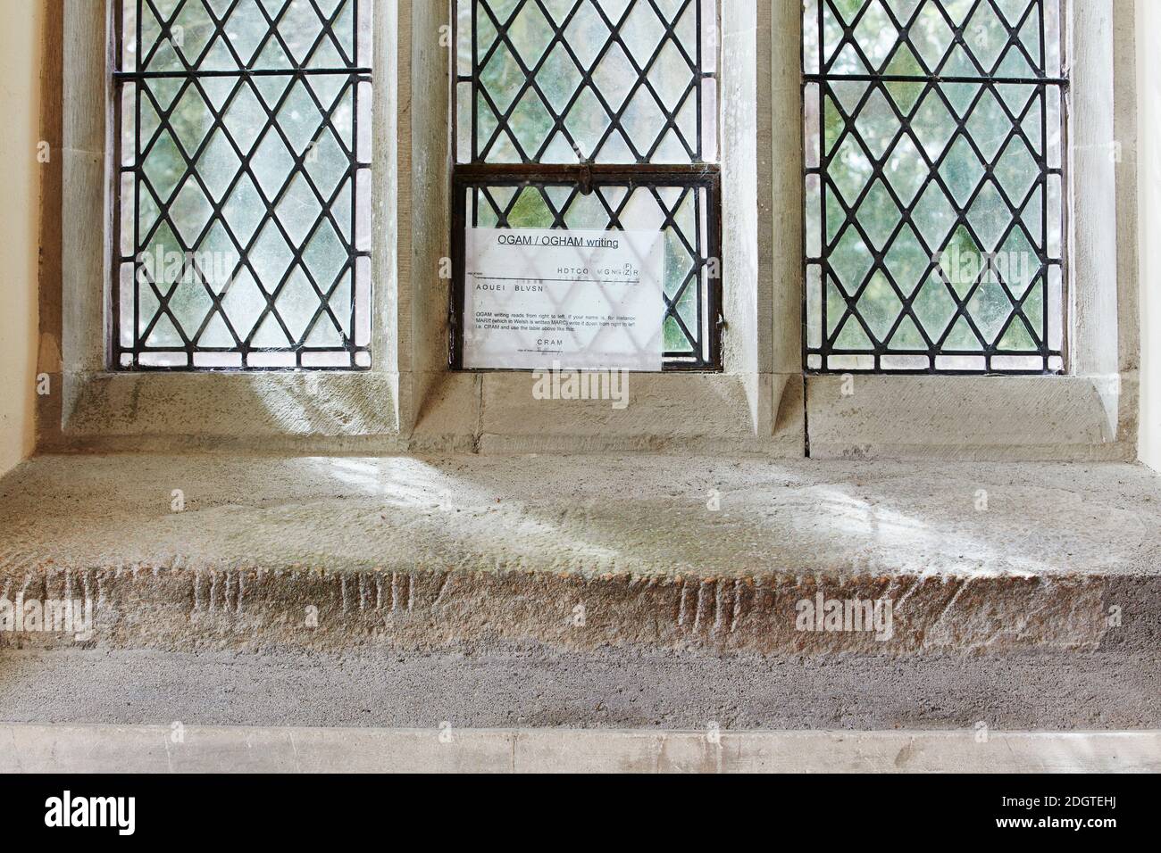 Celtic Ogham script carved onto the Maglocunus stone, St. Brynach's ...