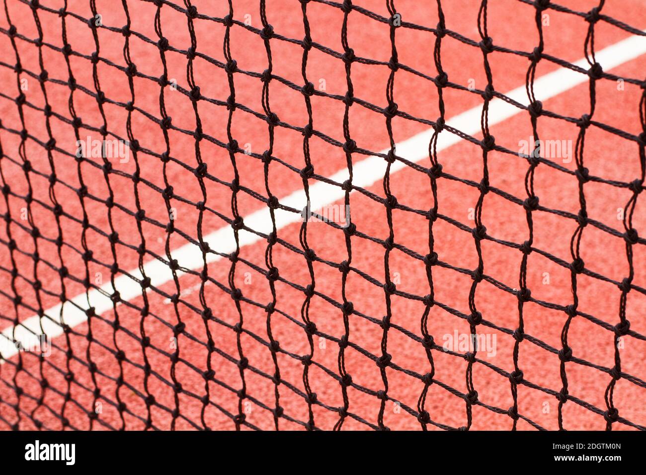 Net of a tennis court in a close up view Stock Photo - Alamy