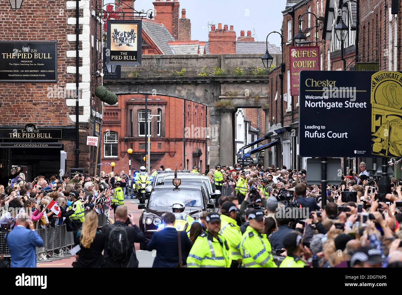 A view of the motorcade as Queen Elizabeth II and the Duchess of Sussex ...