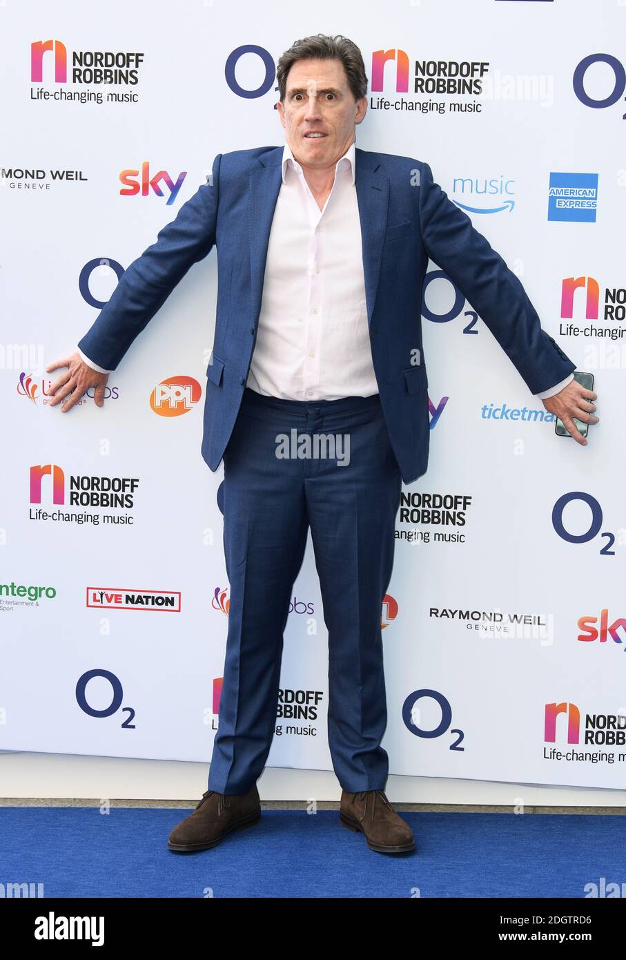 Rob Brydon attending the Nordoff Robbins O2 Silver Clef Awards held at ...