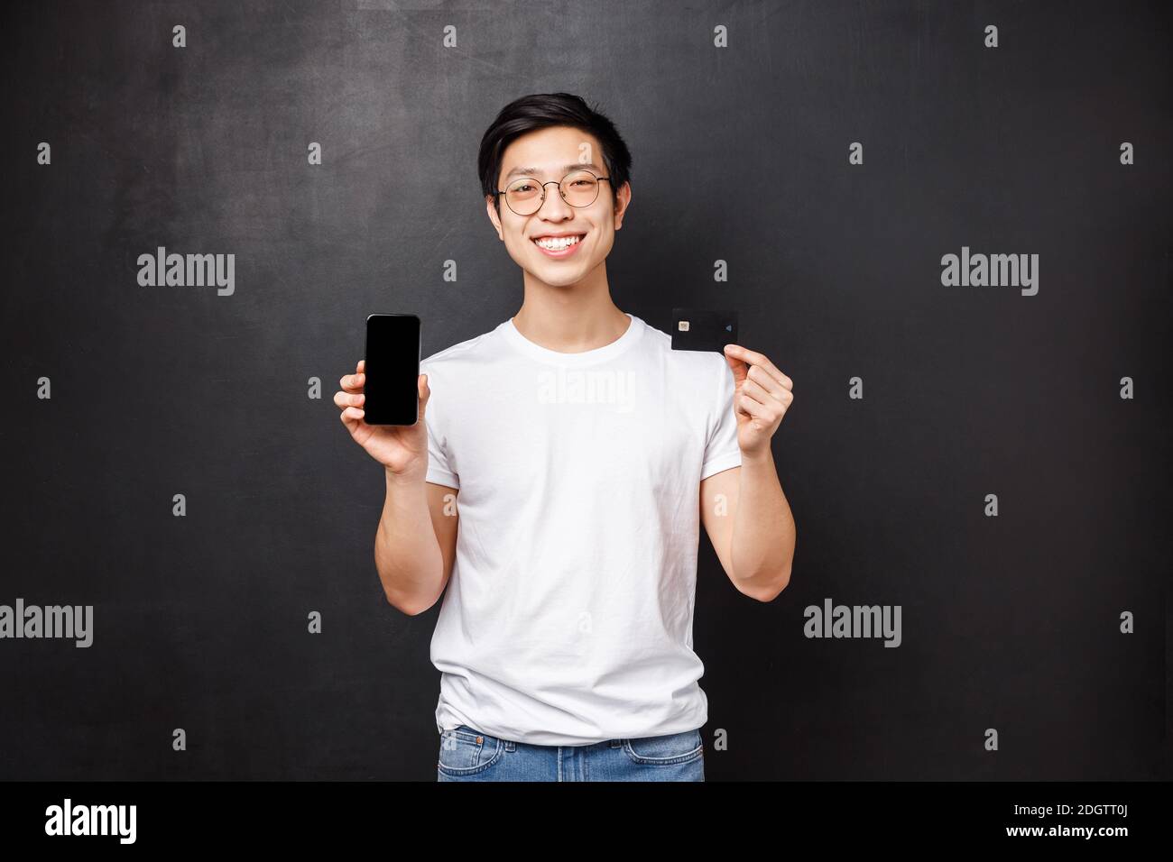 Bank, finance and payment concept. Portrait of simple asian guy in ...