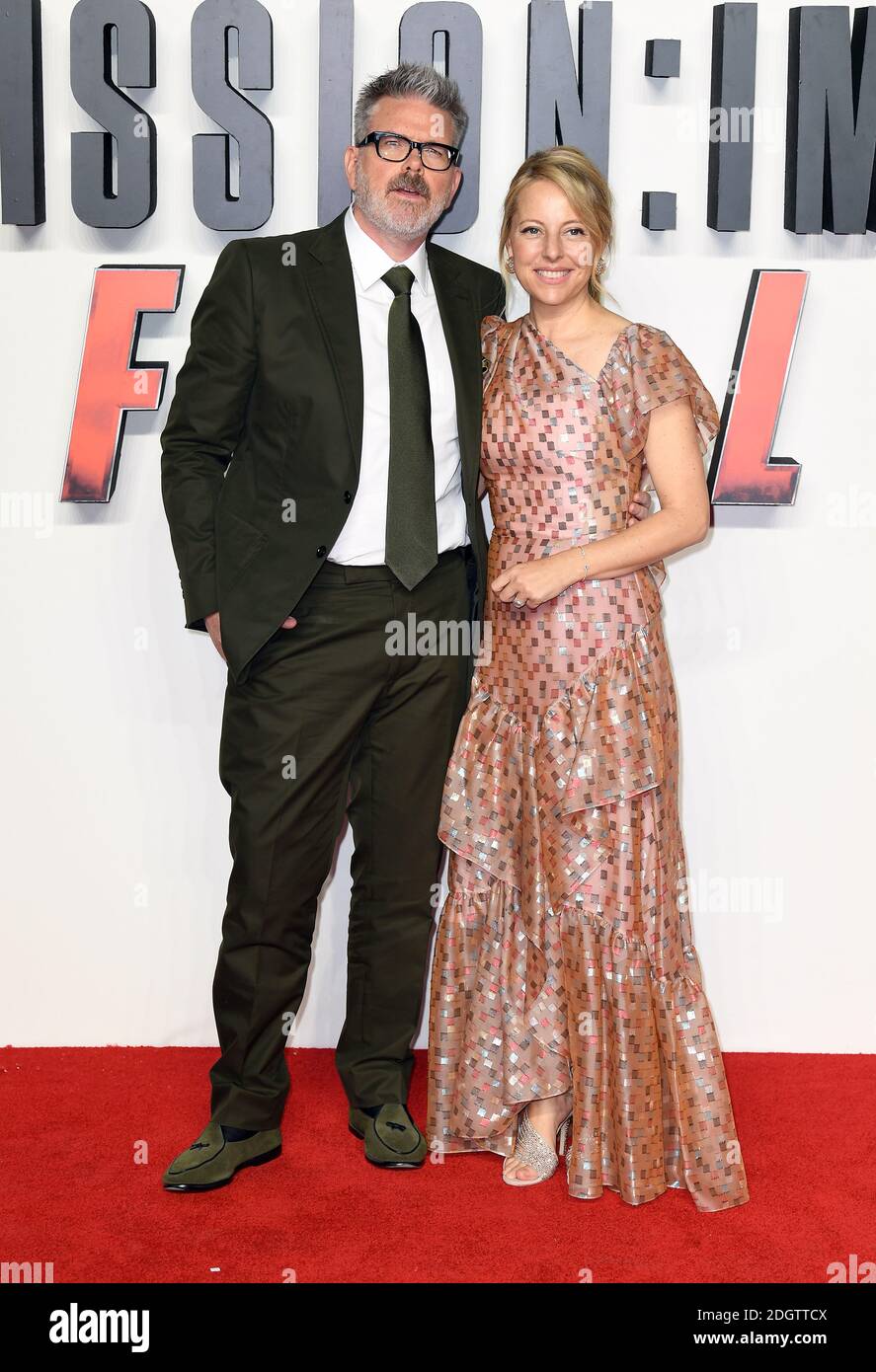 Director Christopher McQuarrie (left) and Heather McQuarrie arriving ...