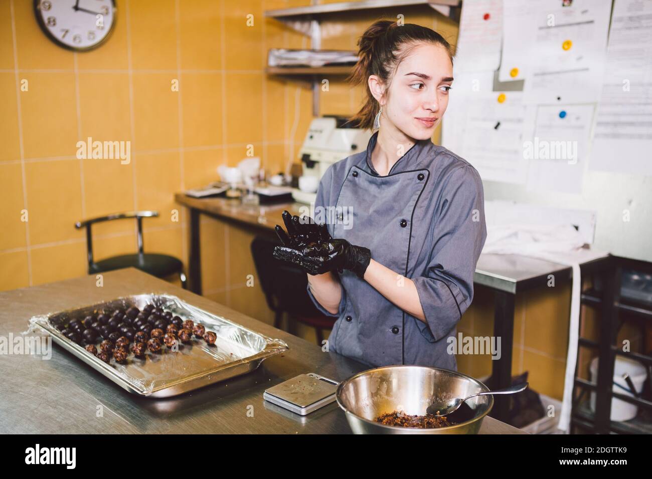 Subject profession and cooking pastry. young Caucasian woman with ...
