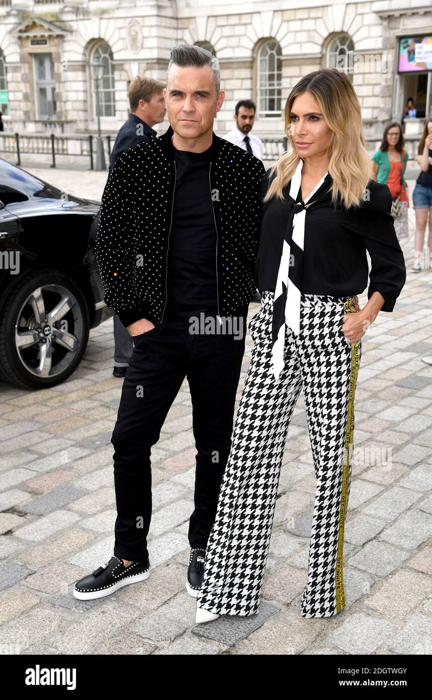 Robbie Williams and Ayda Field arrive at the X Factor photocall held at ...