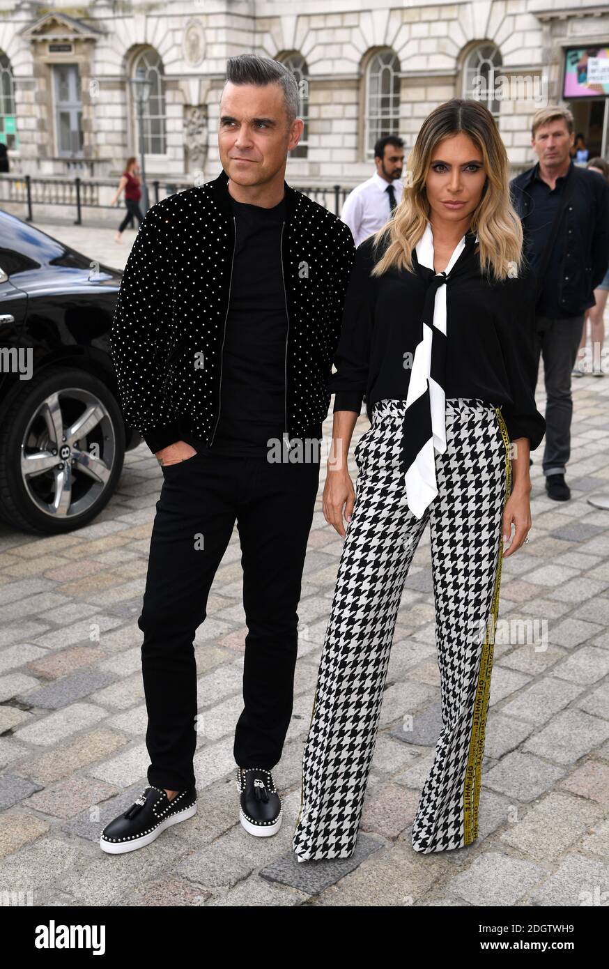 Robbie Williams and Ayda Field arrive at the X Factor photocall held at ...