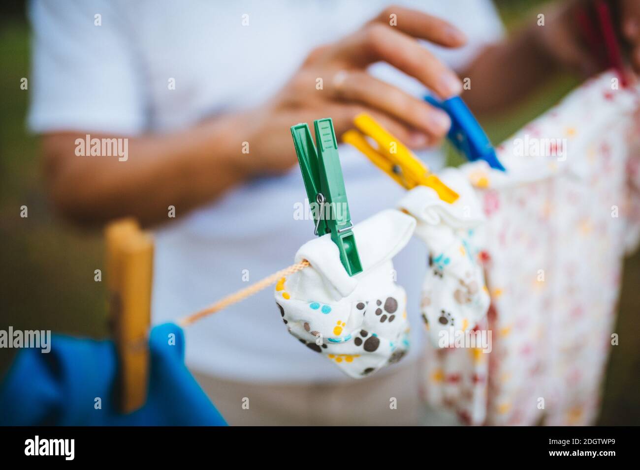 Children's clothes washing line hi-res stock photography and images - Alamy