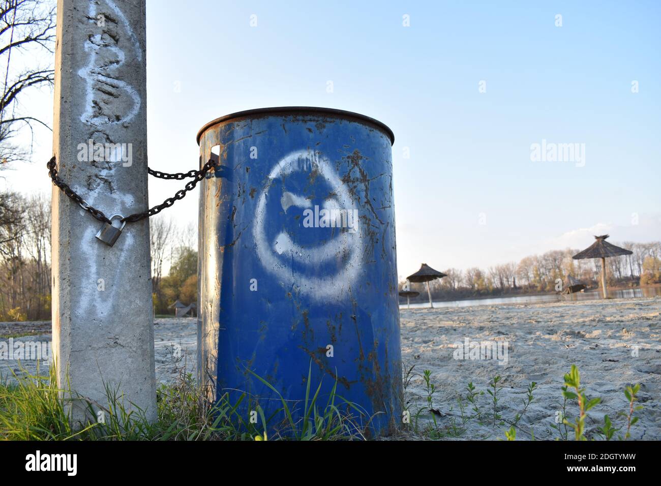 Blue metal barrel Stock Photo - Alamy