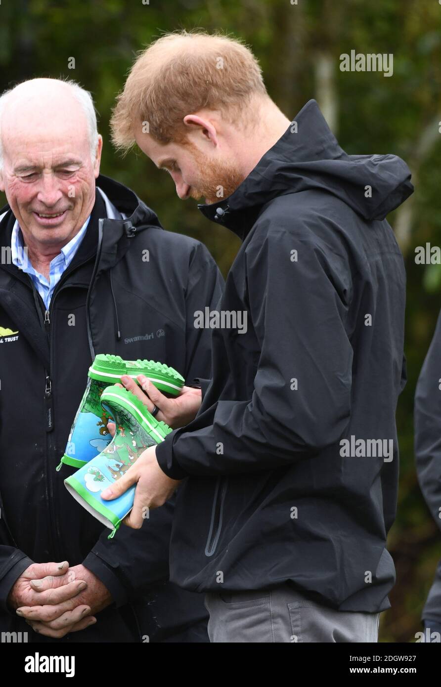 Prince Harry Duke of Sussex and Meghan Duchess of Sussex take part in ...