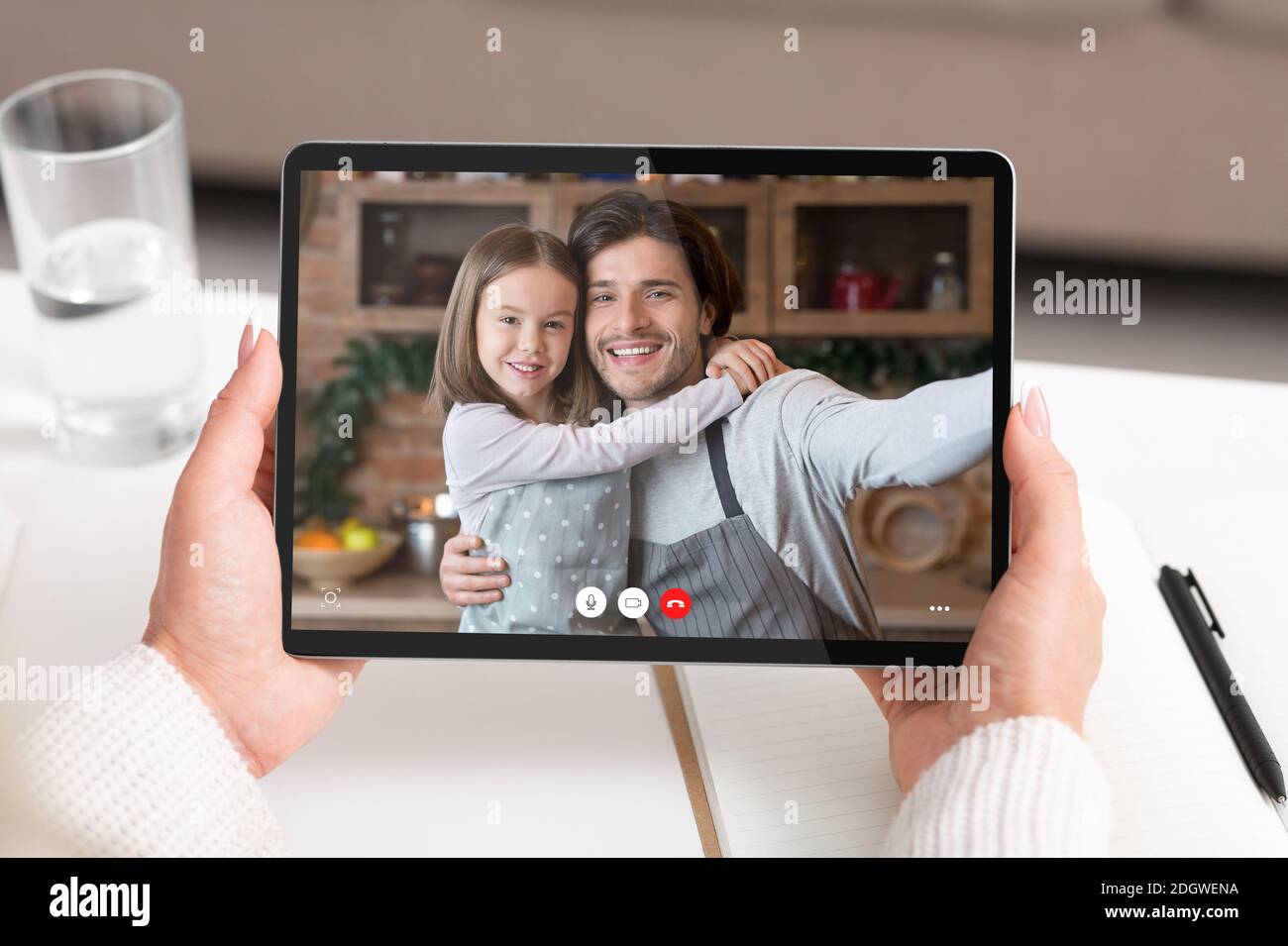 Grandmother Making Video Call Talking With Son And Grandchild Indoor ...