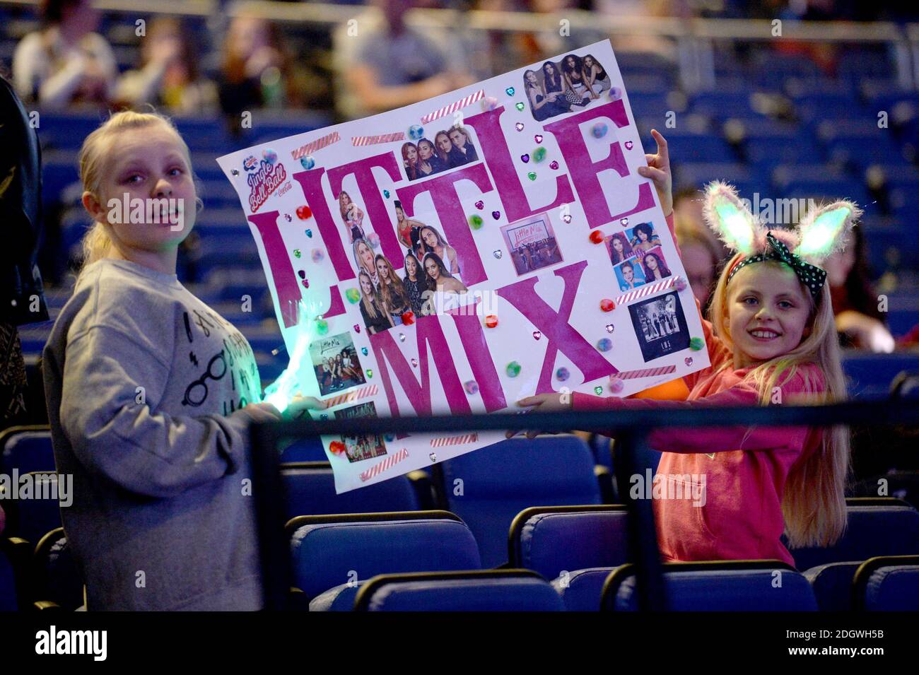 Little Mix fans hold up a sign prior to the beginning of day two of ...