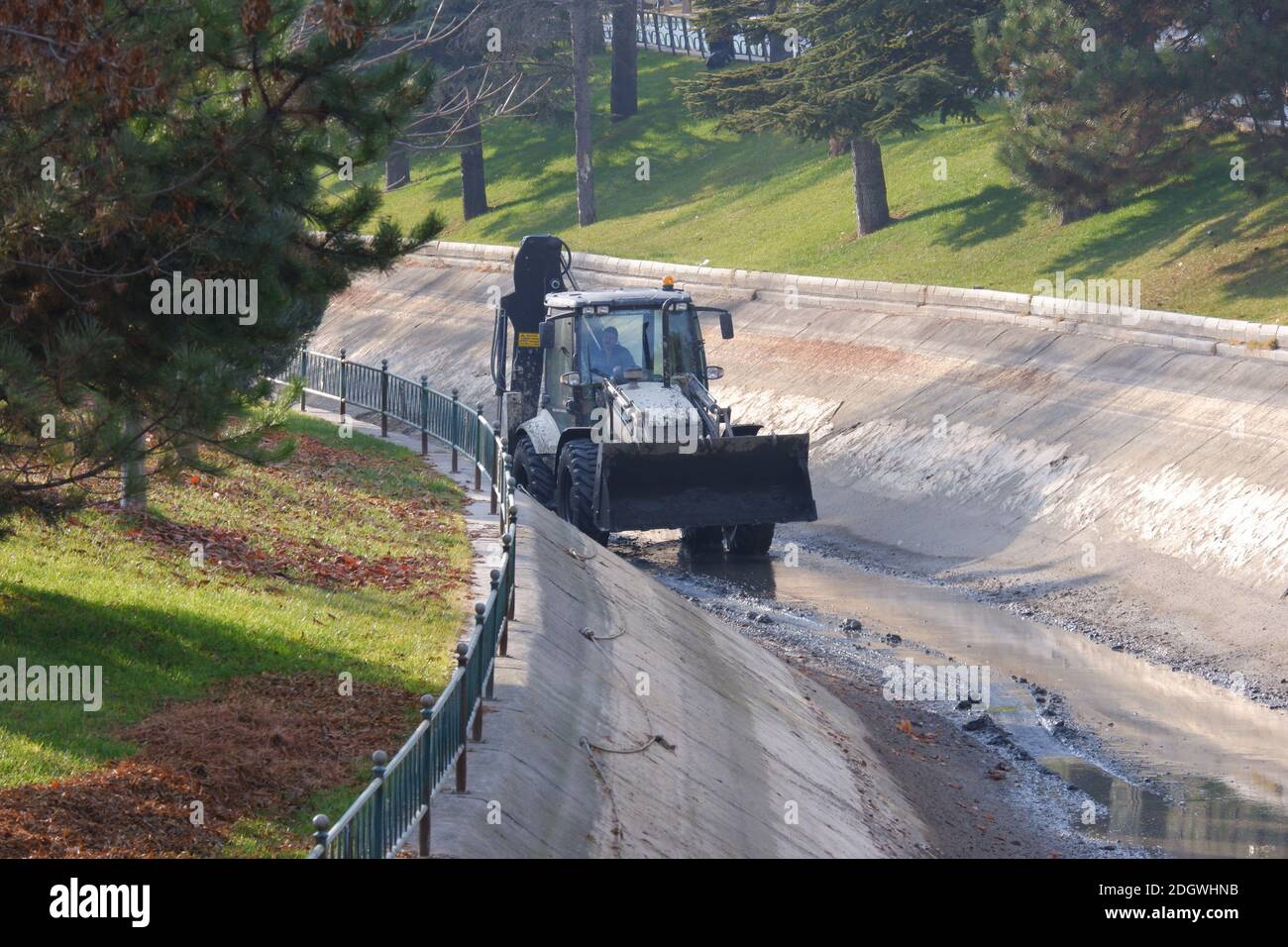 Bulldozer working at water canal Stock Photo - Alamy