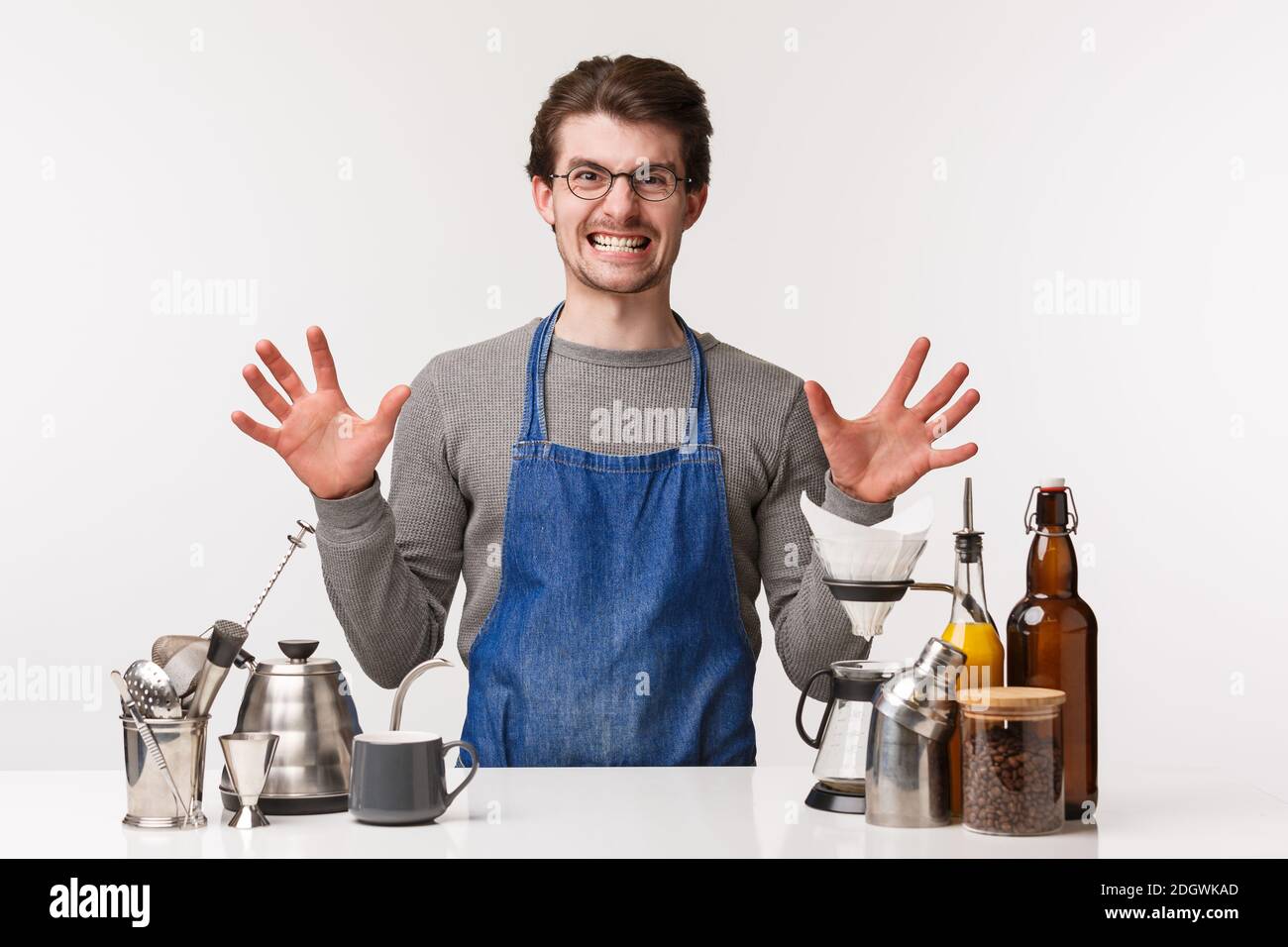 Barista, cafe worker and bartender concept. Portrait of pissed-off ...