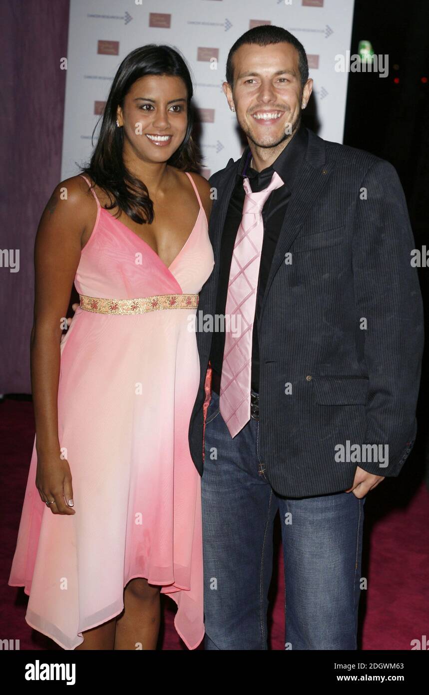 Pooja Shah and Lee Latchford arriving at Cancer Research's A Touch Of ...