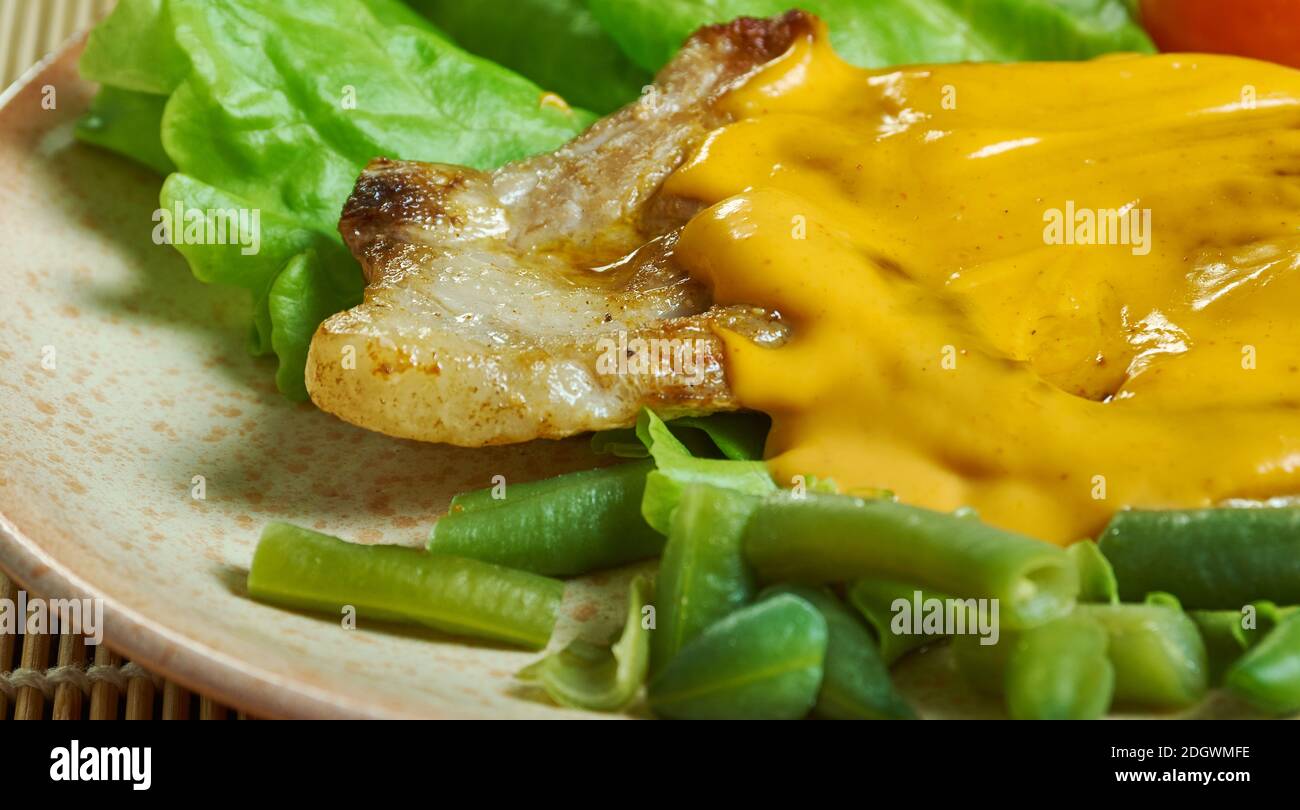 Pork chops and Sauce poivrade, classic French pepper sauce Stock Photo ...
