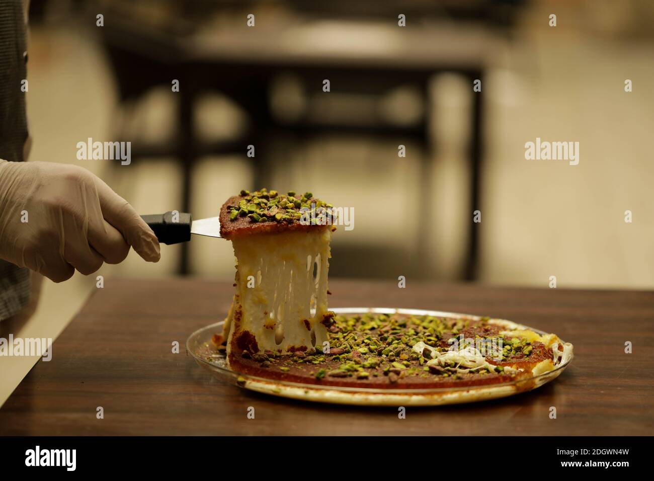 July 21, 2020: Gaziantep, Turkey. Kanafeh is a middle eastern dessert ...