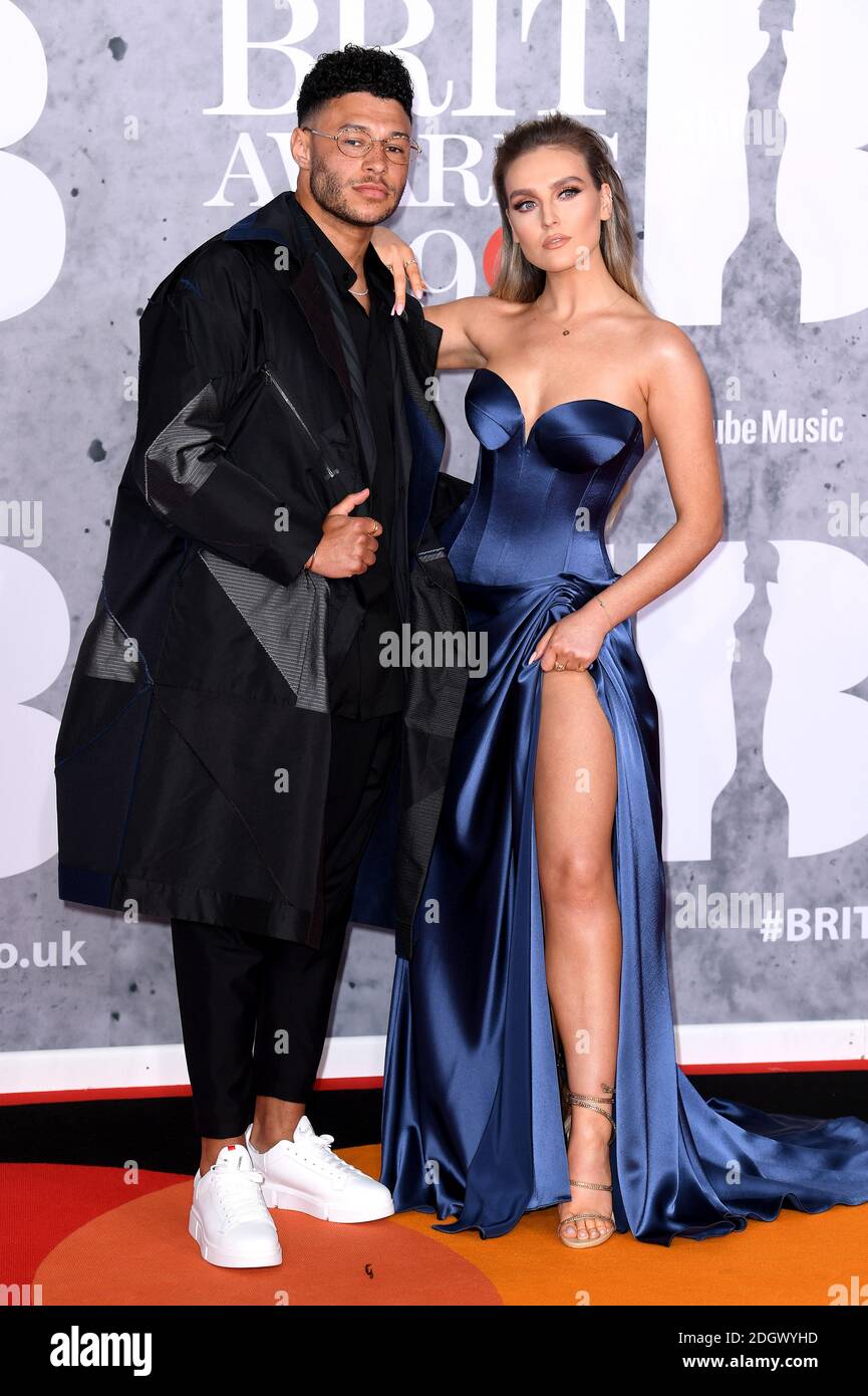 Alex Oxlade-Chamberlain and Perrie Edwards attending the Brit Awards ...