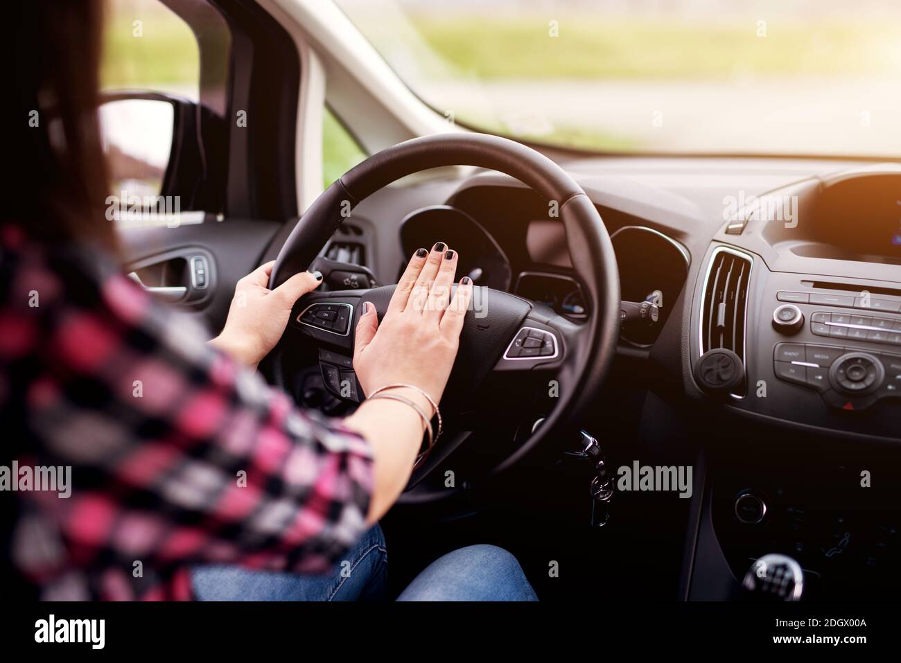 Woman honking car horn hi-res stock photography and images - Alamy