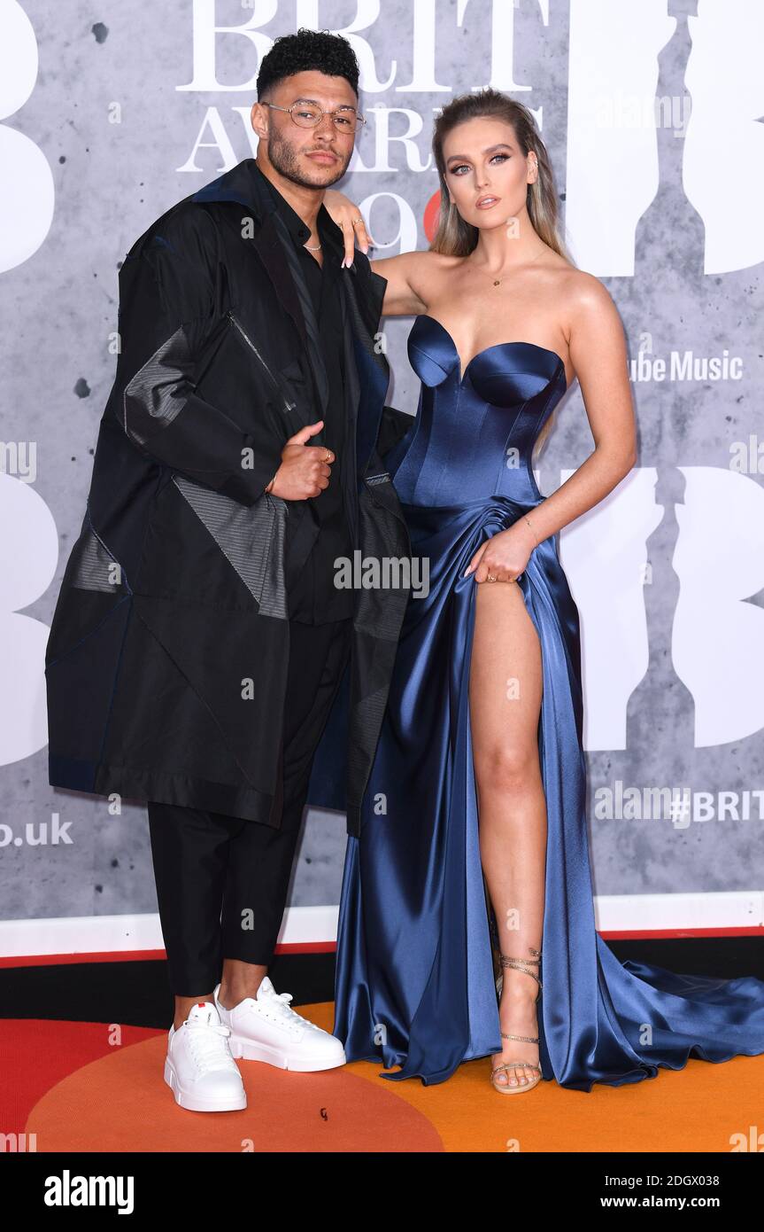 Alex Oxlade-Chamberlain and Perrie Edwards of Little Mix attending the ...