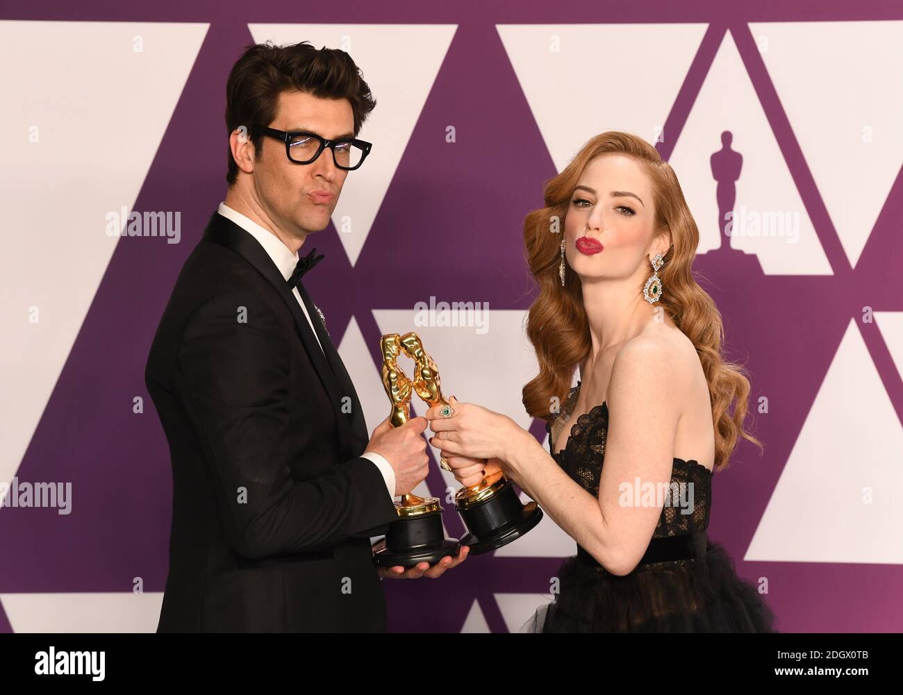 Guy Nattiv (left) and Jaime Ray Newman with the award for Short Film ...