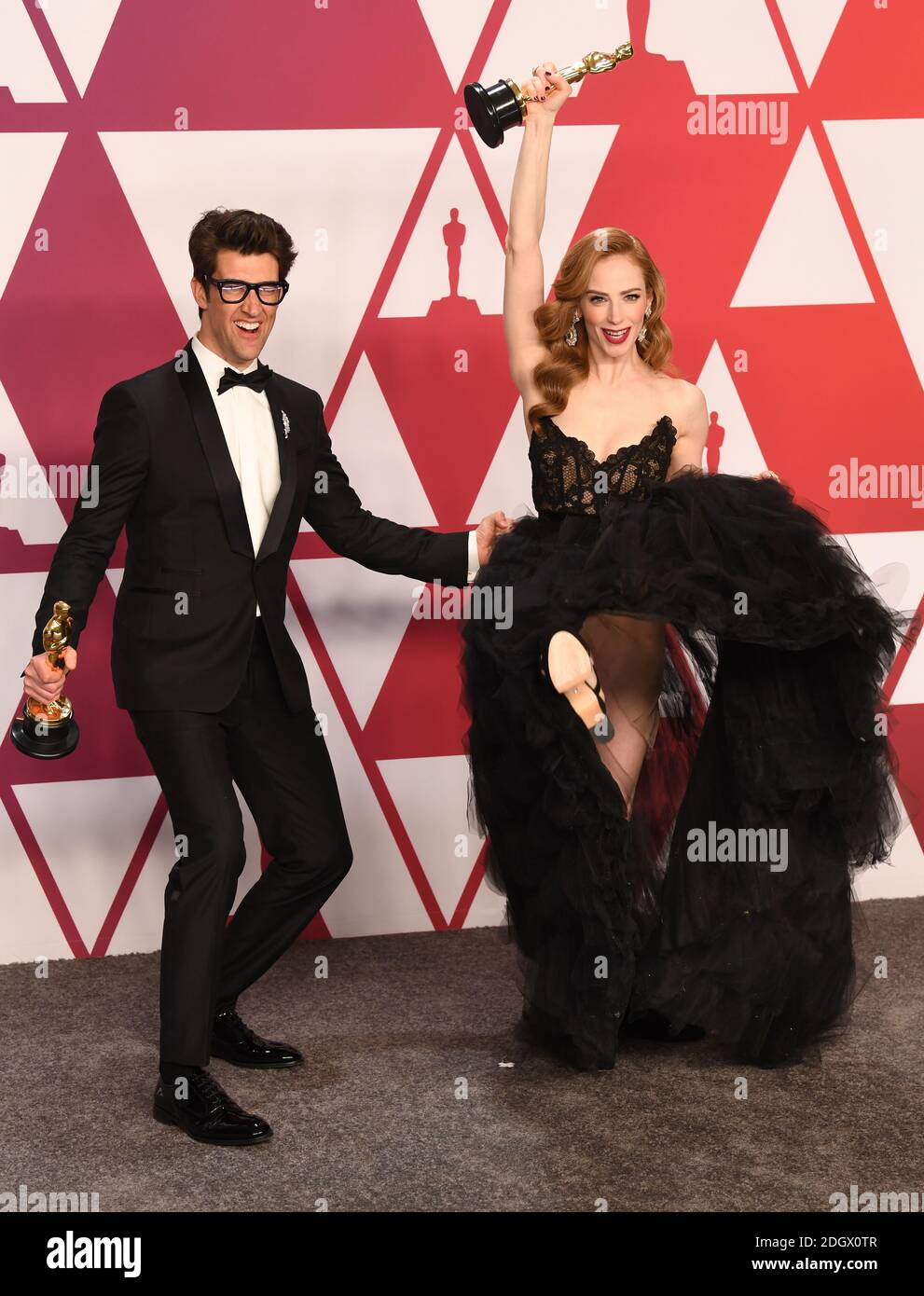 Guy Nattiv (left) and Jaime Ray Newman with the award for Short Film ...