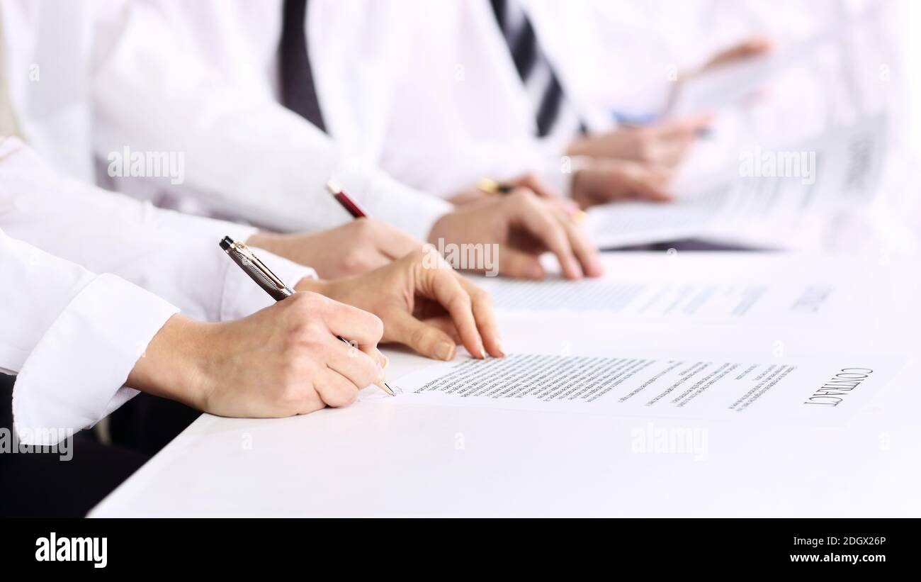 close up. group of employees studying business documents Stock Photo ...