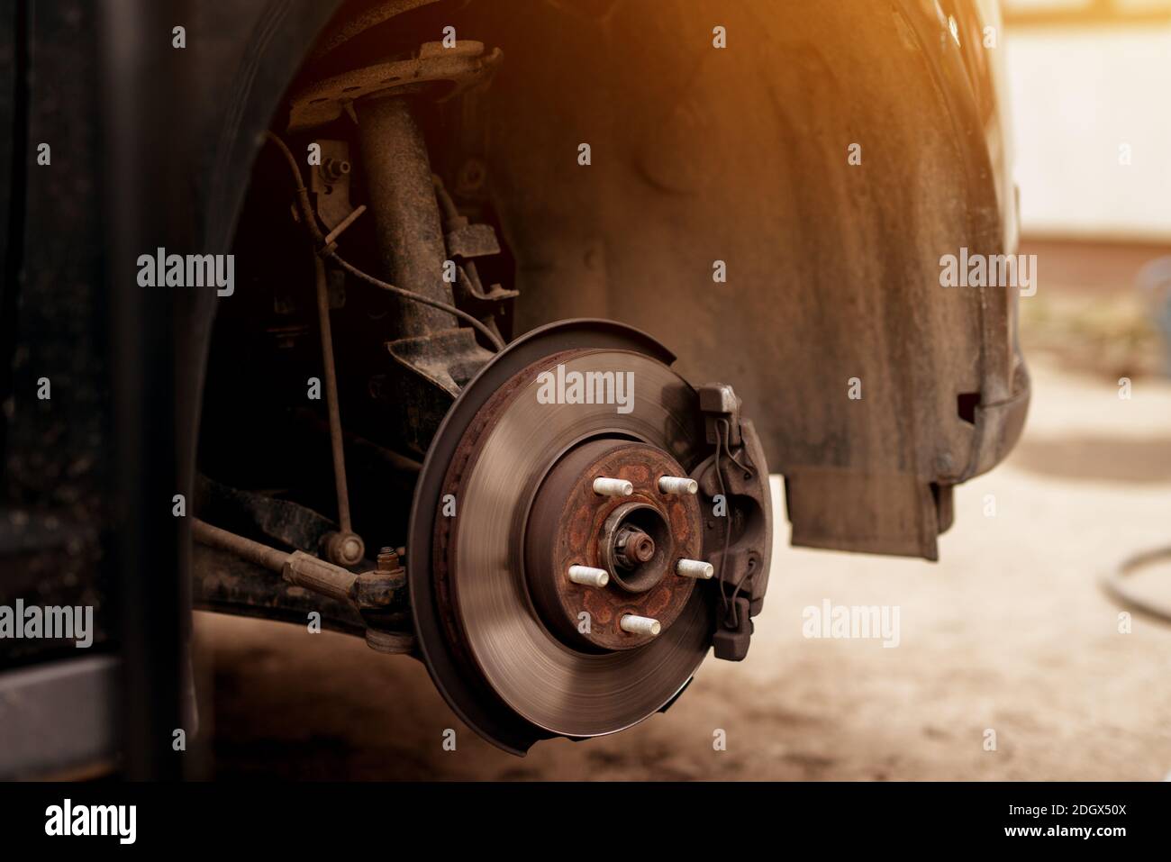 Old worn out rusty car wheel disk and breaks ready for repairs Stock ...