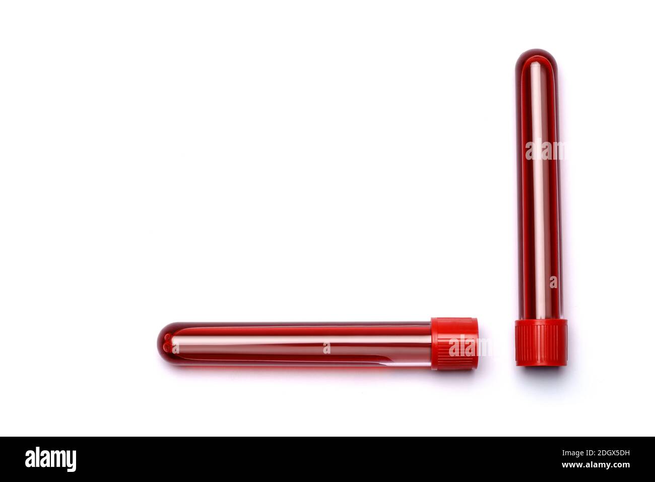 Test tube with red plug isolated on white background Stock Photo - Alamy