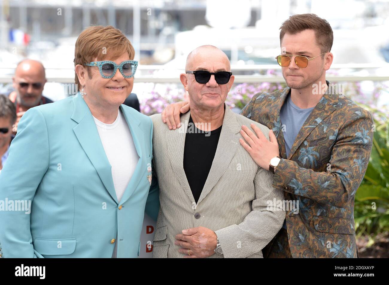 Elton John (left) , Bernie Taupin and Taron Egerton at the Rocketman ...