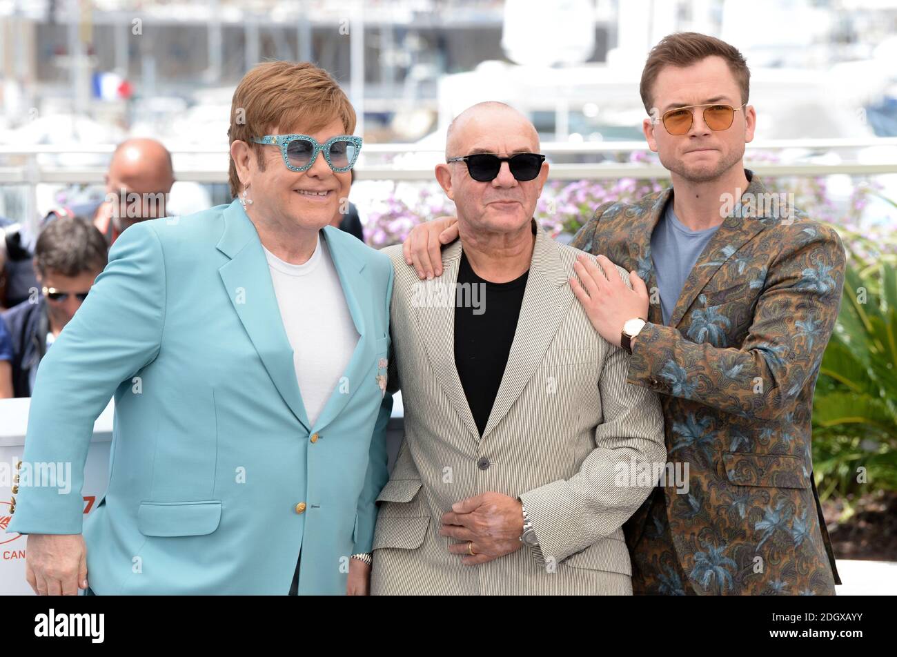 Elton John (left) , Bernie Taupin and Taron Egerton at the Rocketman ...