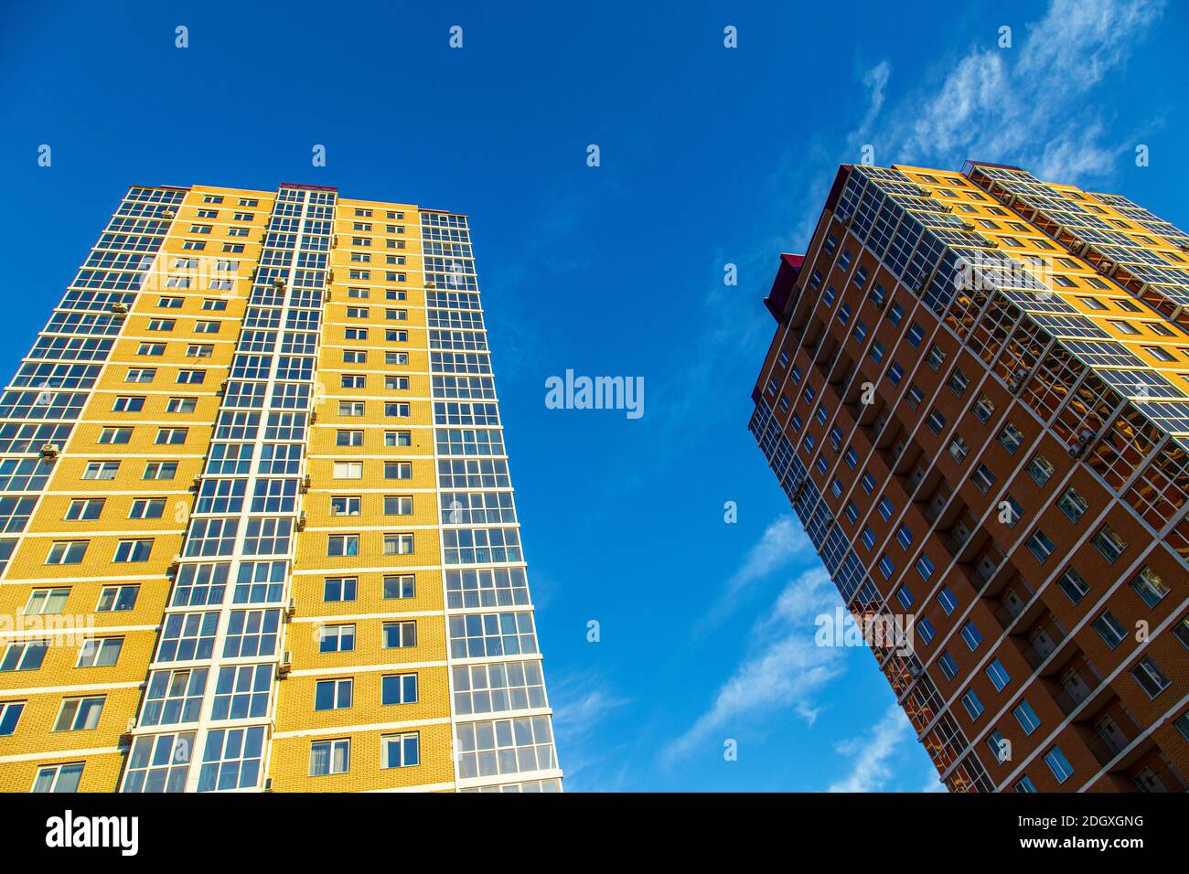 Modern multi-storey residential buildings made of bricks and glass ...