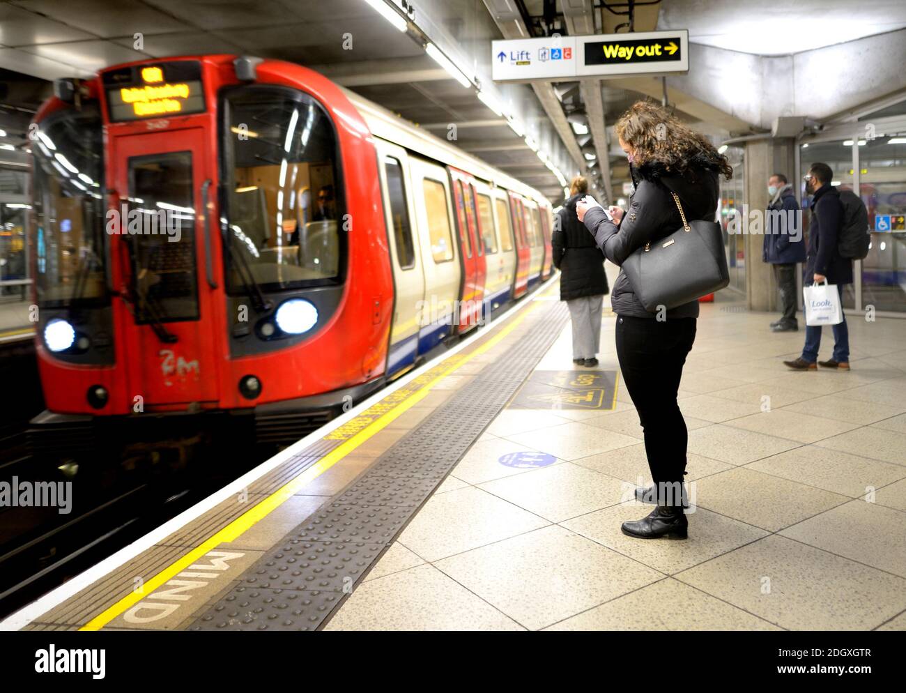 London, England, UK. Westminster underground station, train arriving at ...