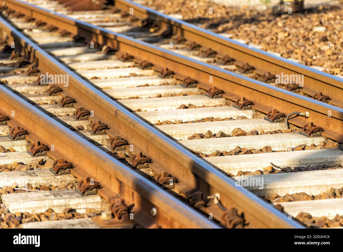 Rails in a railway station Stock Photo - Alamy