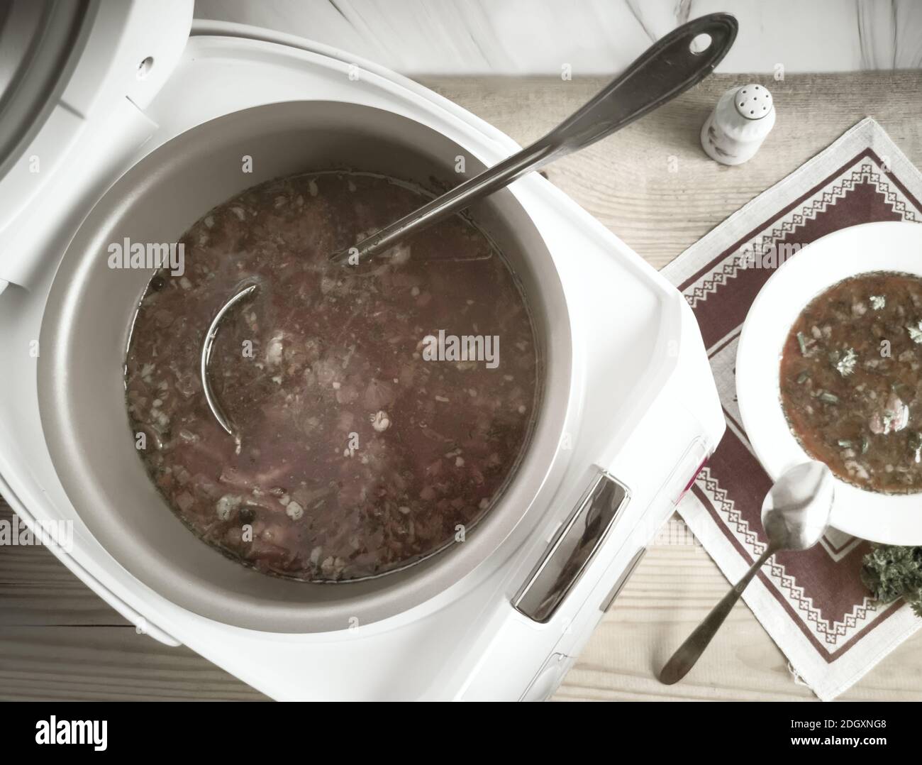 Delicious Ukrainian borscht is cooked in a slow cooker Stock Photo - Alamy