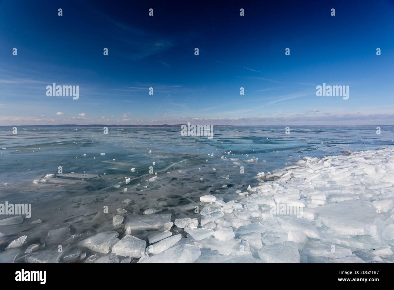 frozen lake Balaton with beautiful sky Stock Photo - Alamy