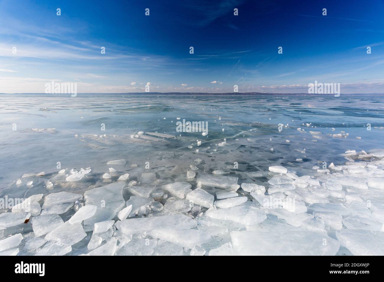 frozen lake Balaton with beautiful sky Stock Photo - Alamy