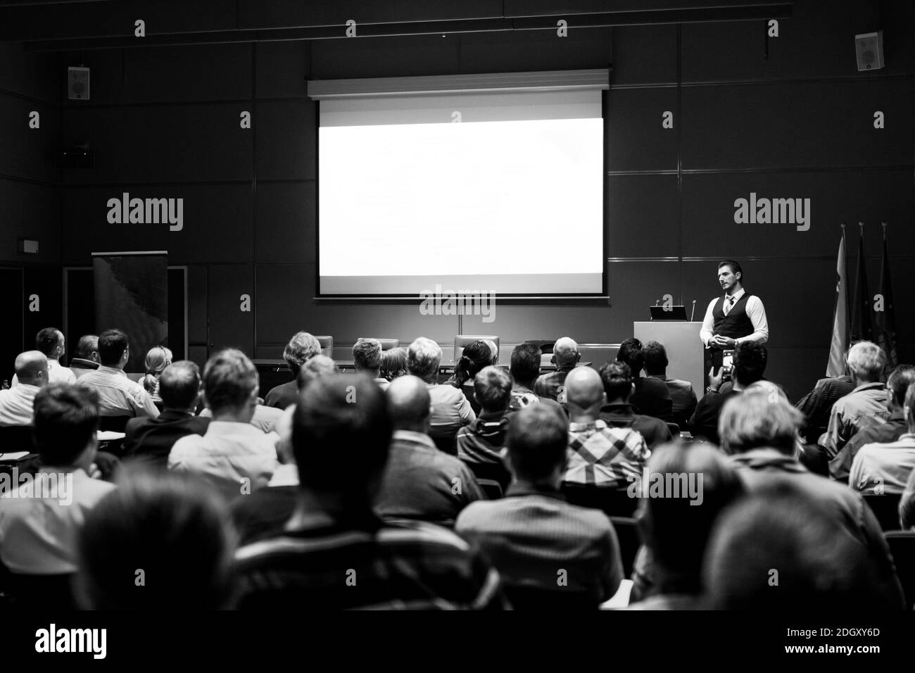Speaker giving presentation on business conference event Stock Photo ...