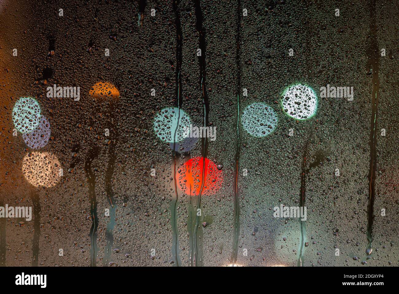 an abstract background of night wet window glass with smudges Stock ...