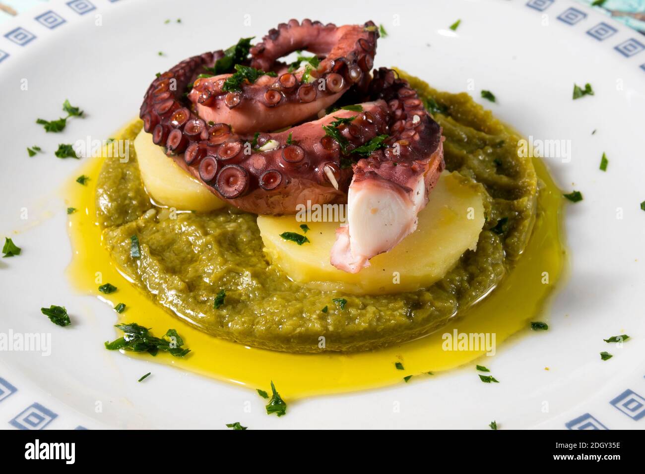 Octopus cooked at low temperature Stock Photo - Alamy