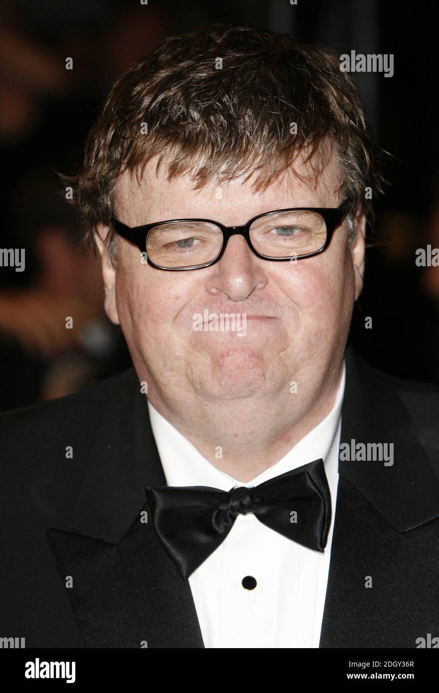 Documentary film maker Michael Moore arrives for the premiere of Sicko ...