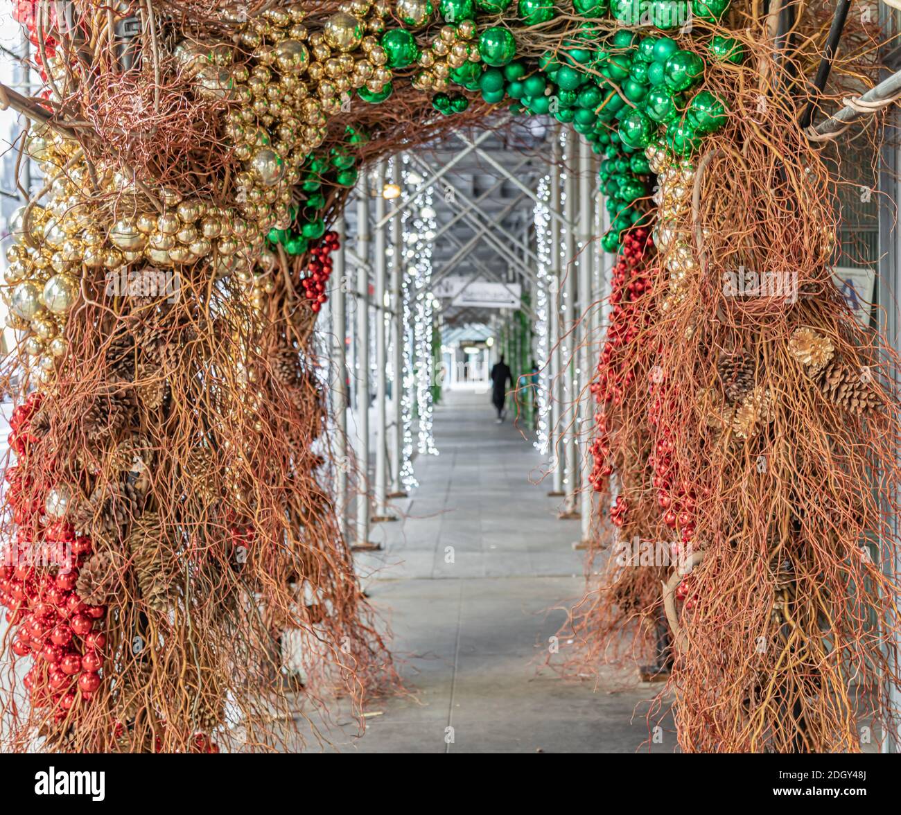 Christmas decorations on a scaffolding on the side walk of 57th Street ...