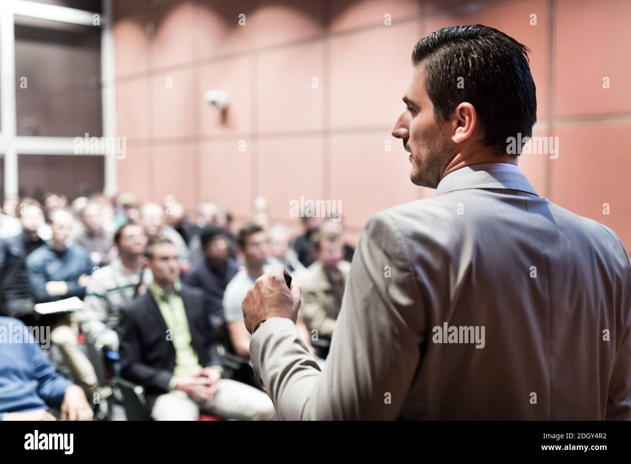 Public speaker giving talk at business event Stock Photo - Alamy