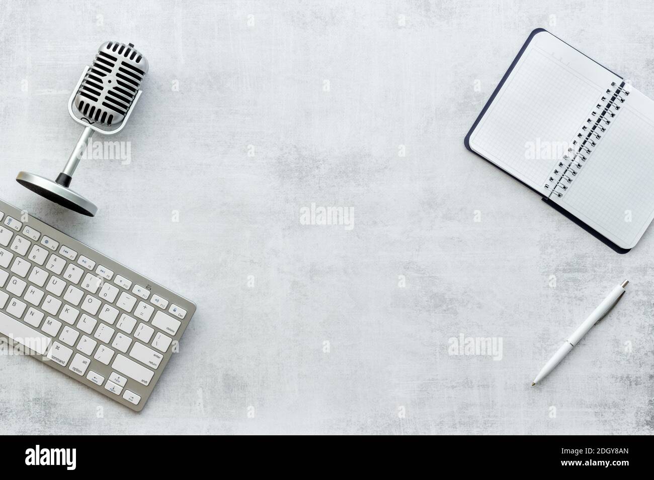 Microphone and keyboard on studio table, top view. Audio equipment and ...