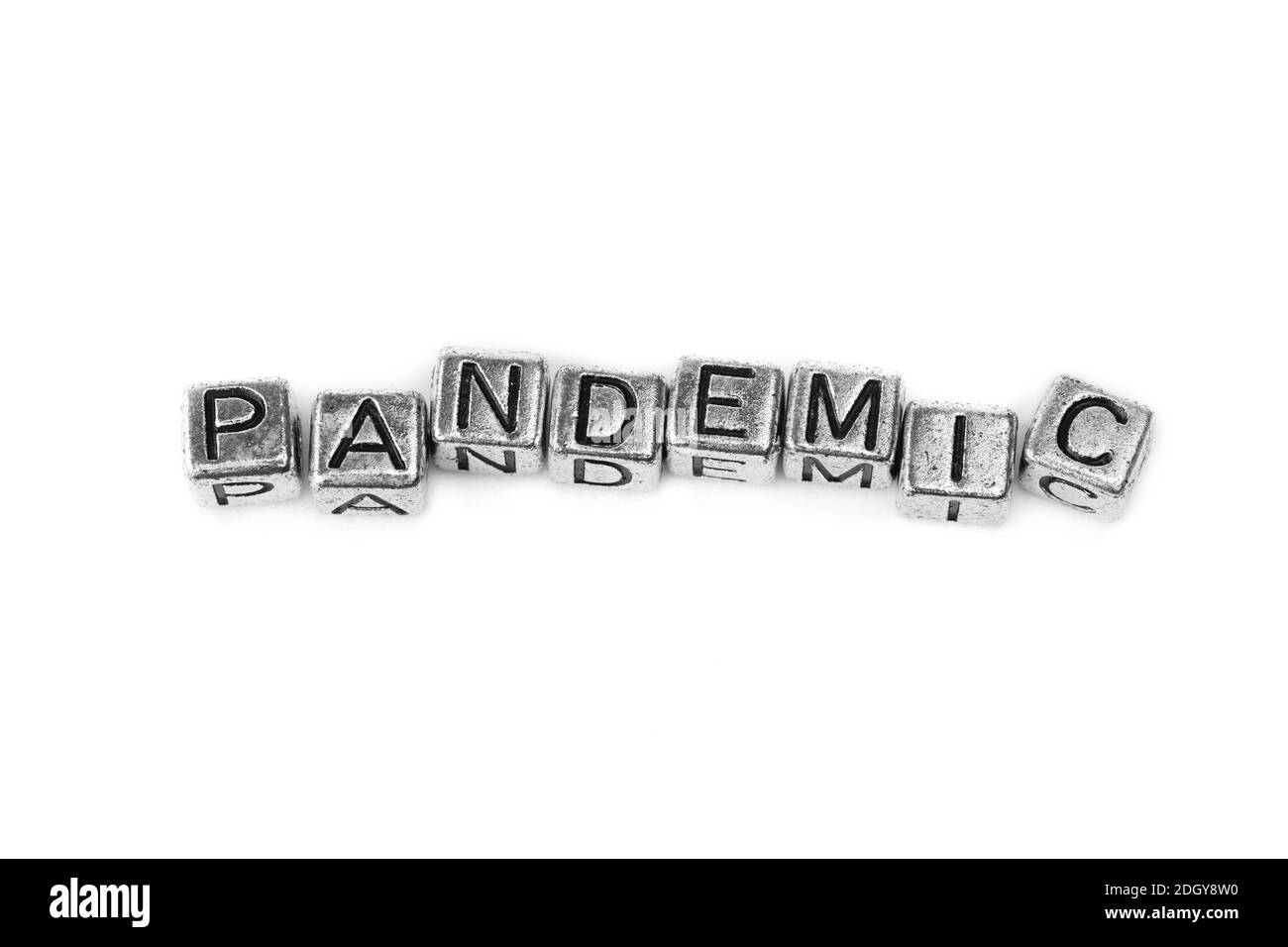 focus on word pandemic written with metal cubes on white background ...