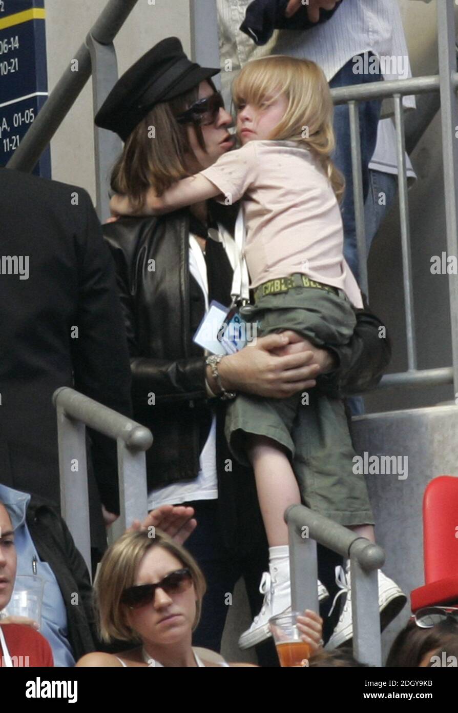 Liam Gallagher and son live at the Live Earth London Concert, Wembley ...