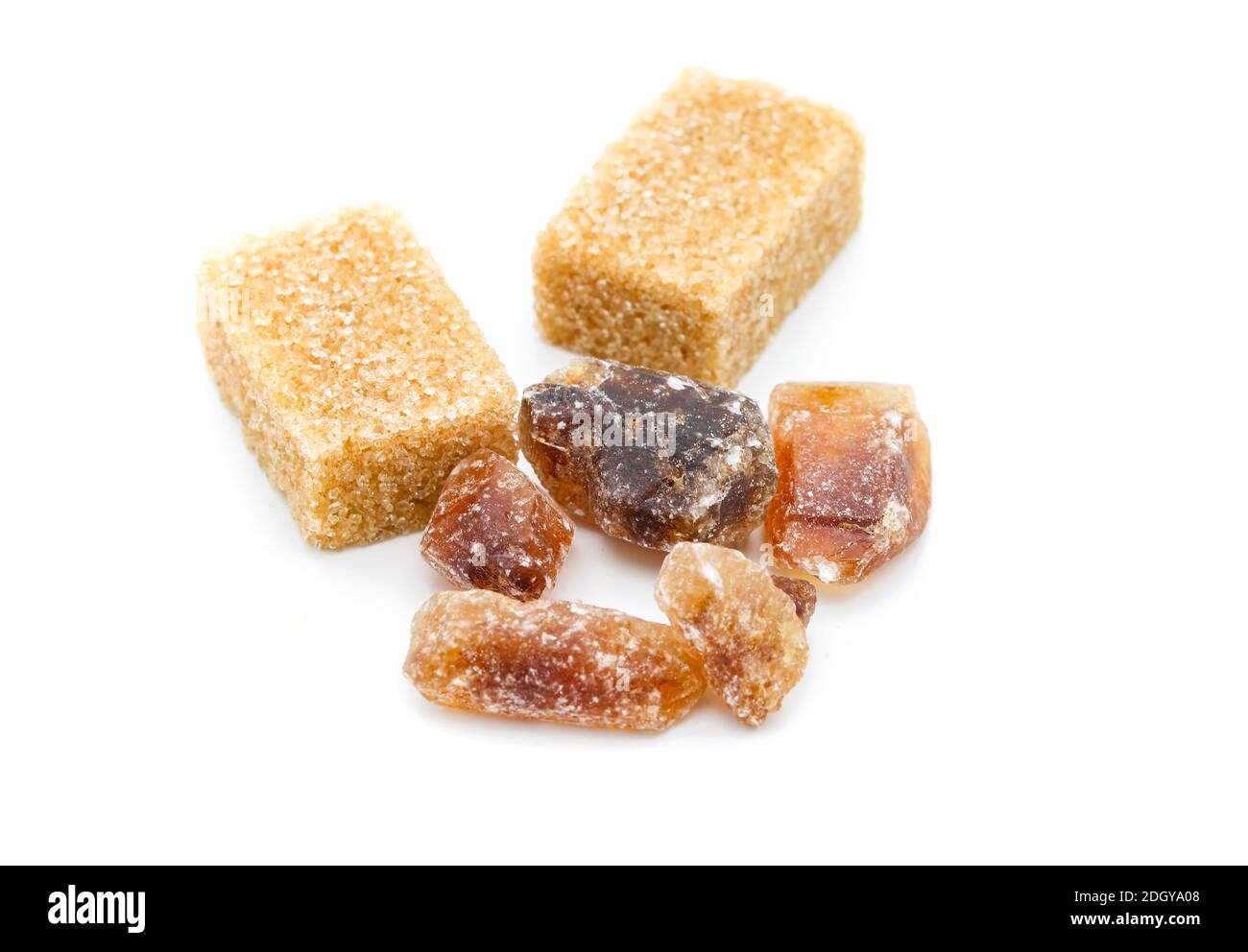 closeup on brown and raw sugar cubes isolated on white background Stock ...