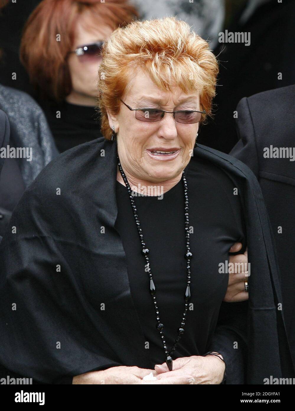 Mike Reid's widow Shirley arrives at the funeral of her late husband ...